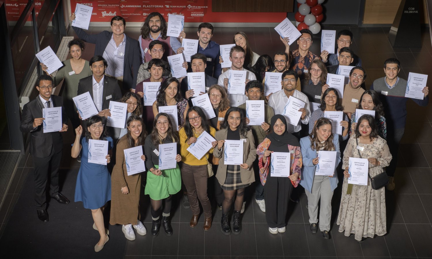 UT students receive scholarship certificate during Scholarship Ceremony